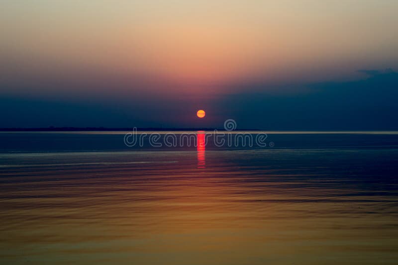 Turquoise sunset stock image. Image of orange, ocean - 30991043
