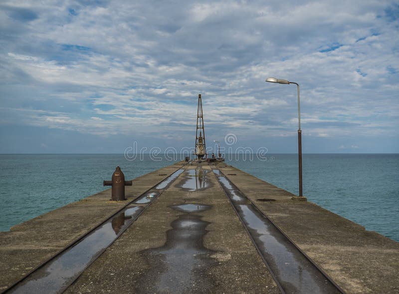 Marine Concrete Breakwaters Anchors in Shallow Water. Traveling-wave ...