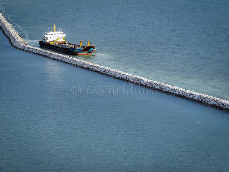 Marine Construction Vessel Working on Stone Breakwater Project in Ocean ...