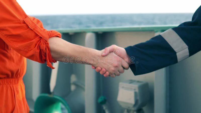 Marine Contractor Businessman Handshaking with Worker on the Ship ...