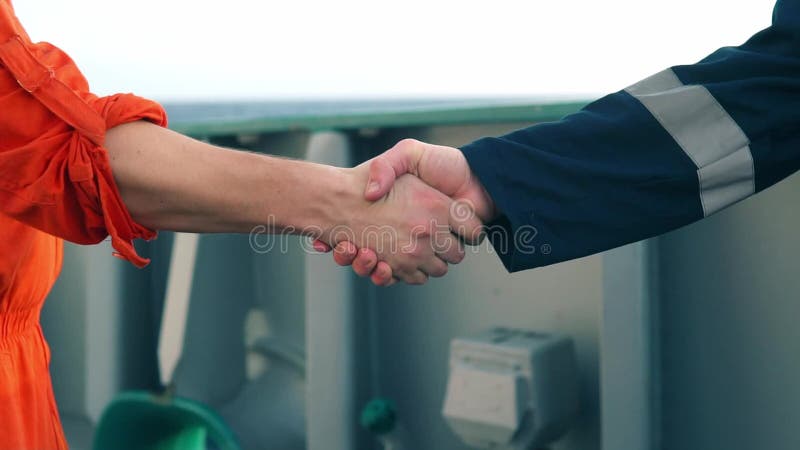 Marine Contractor Businessman Handshaking with Worker on the Ship ...