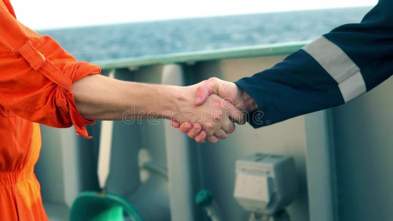 Marine Contractor Businessman Handshaking with Worker on the Ship ...