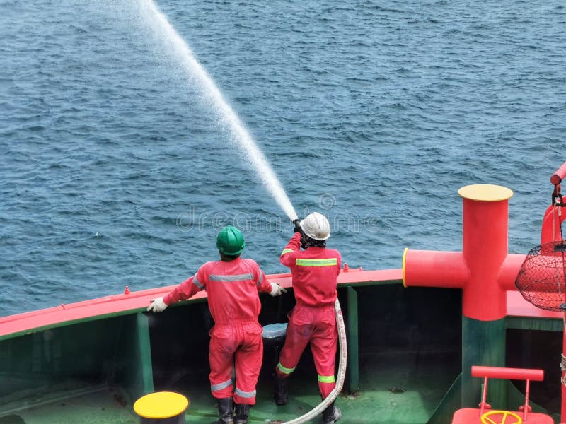 Marine Crew Testing a Fire Hydrant Omboard Marine Vessel during ...