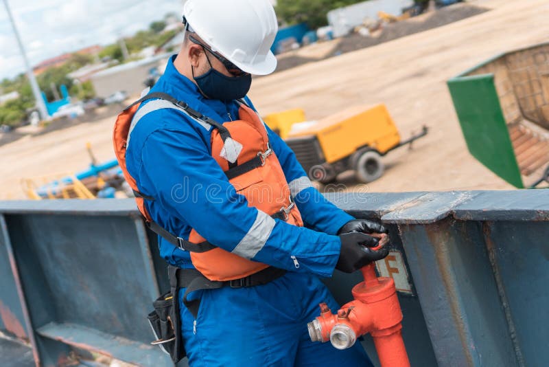 Marine Deck Officer with Protective Mask Performing Work Stock Photo ...