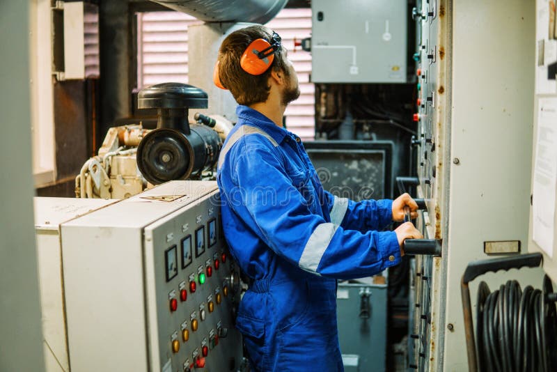Marine Engineer Inspecting Ship`s Engine or Generators Stock Photo ...