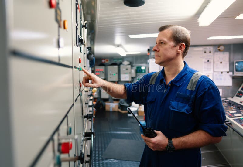 Marine Engineer Officer Controlling Vessel Engines and Propulsion in ...