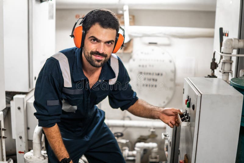 Marine Engineer Officer Working in Engine Room Stock Image - Image of ...