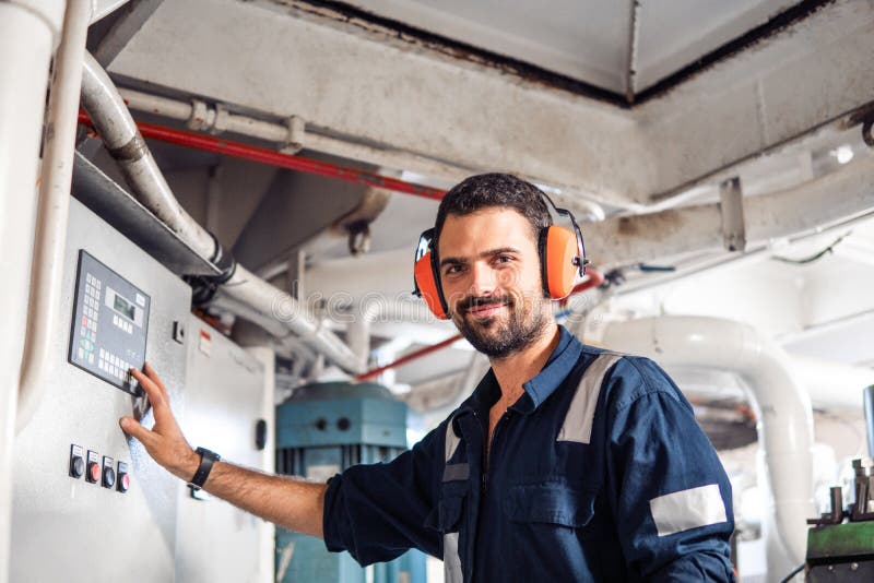 Marine Engineer Officer Working in Engine Room Stock Photo - Image of ...