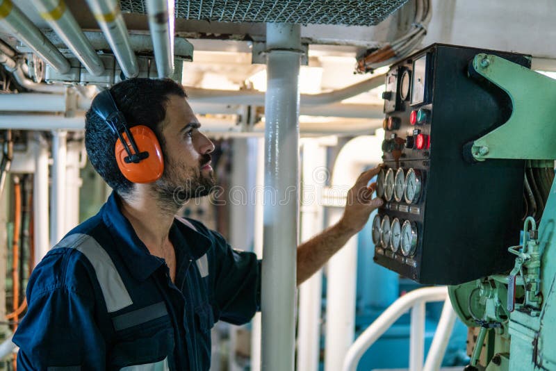 Marine Engineer Officer Working in Engine Room Stock Image - Image of ...