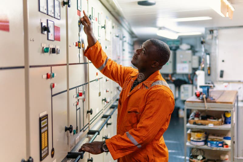Marine Engineer Officer Working in Engine Room Stock Photo - Image of ...