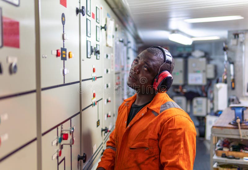 Marine Engineer Officer Working in Engine Room Stock Image - Image of ...