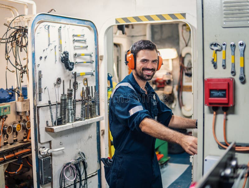 Marine Engineer Officer Working in Engine Room Stock Photo - Image of ...