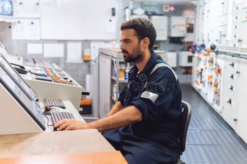 Marine Engineer Officer Working in Engine Room Stock Image - Image of ...