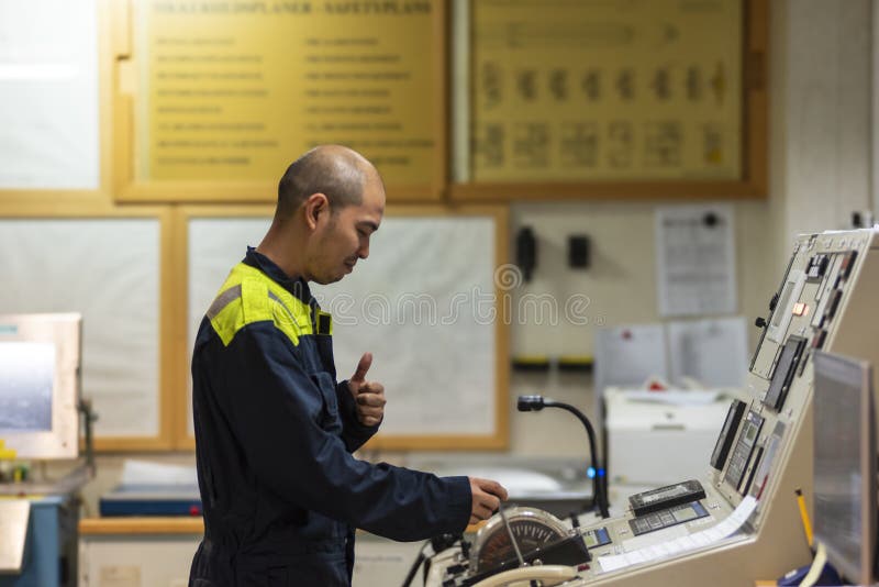 The Marine Engineer Officer Stands at the Main Engine Control Station ...