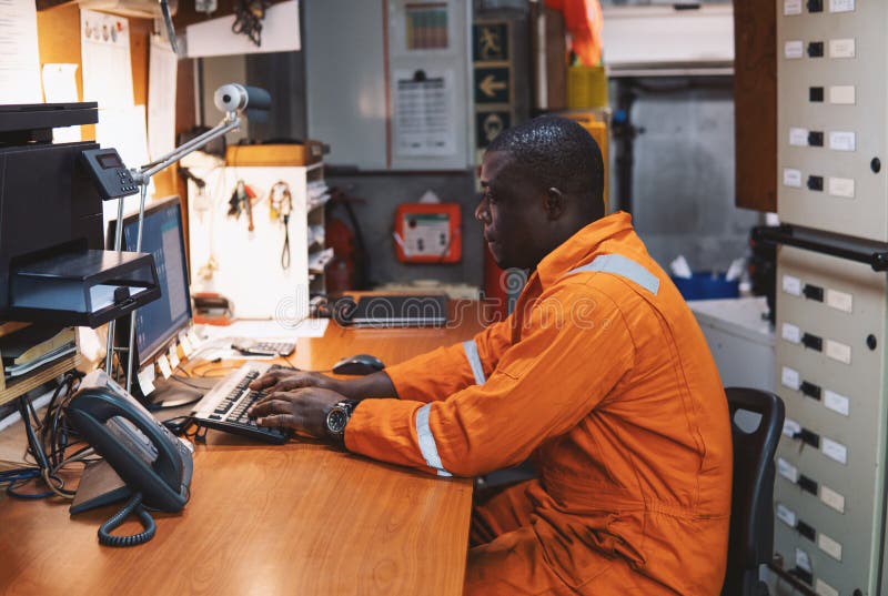 Marine Engineer Officer Working in Engine Room Stock Photo - Image of ...