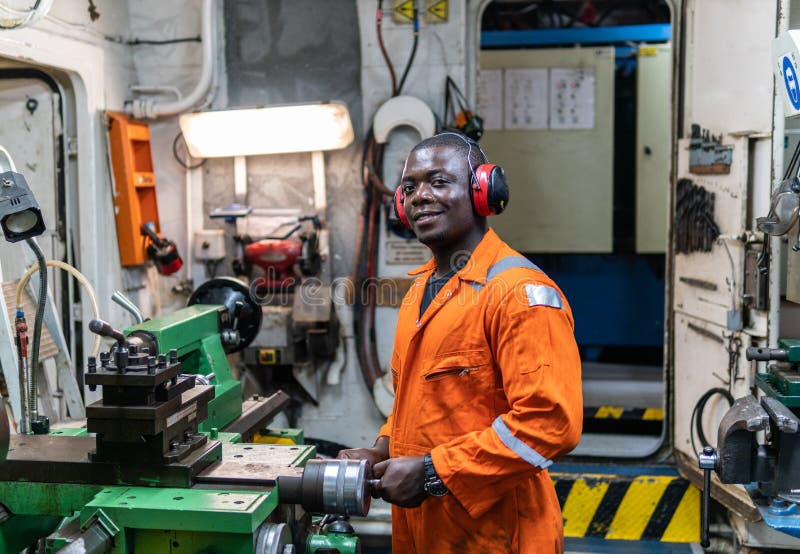 Marine Engineer Officer Working in Engine Room Stock Photo - Image of ...