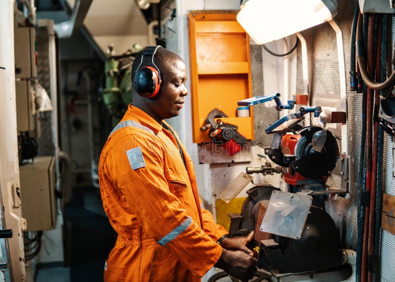 Marine Engineer Officer Working in Engine Room Stock Photo - Image of ...
