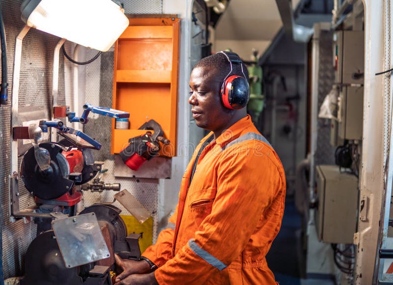 Marine Engineer Officer Working in Engine Room Stock Image - Image of ...