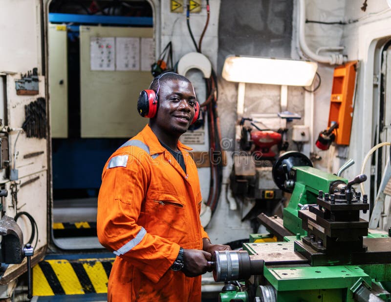 Marine Engineer Officer Working in Engine Room Stock Image - Image of ...