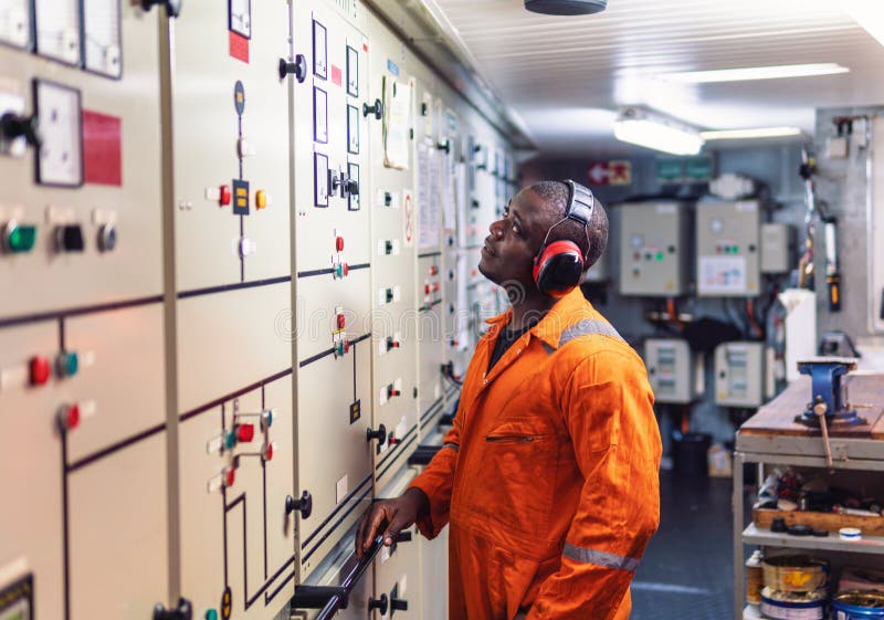 Marine Engineer Officer Working in Engine Room Stock Photo - Image of ...
