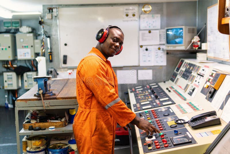 Marine Engineer Officer Working in Engine Room Stock Photo - Image of ...