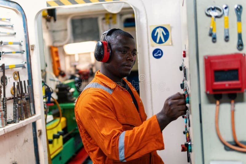 Marine Engineer Officer Working in Engine Room Stock Image - Image of ...