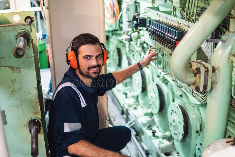 Marine Engineer Officer Working in Engine Room Stock Image - Image of ...