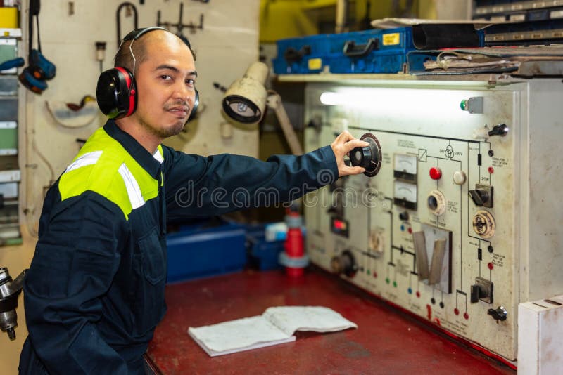 A Marine Engineer Stands at a Testing Station for Electrical and ...