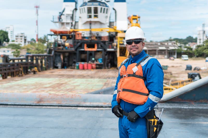 Marine Engineering Officer on the Deck of a Ship. Sailor`s Work Stock ...