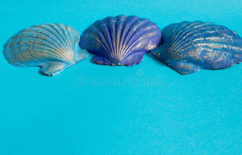 Marine Layout. Three Shells Painted in Blue, Blue and Purple on a Blue ...