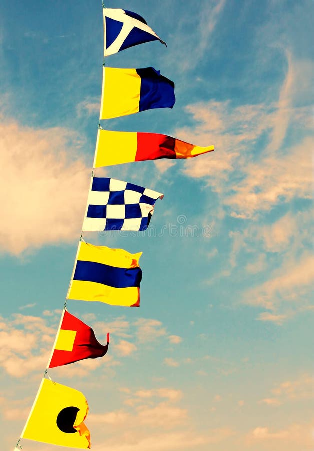 Marine Signal Flags on a Dramatic Sky Backround Stock Image - Image of ...