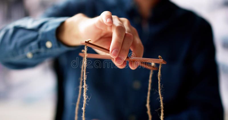 Marionette Manipulation with Hand Holding Strings Stock Photo - Image ...