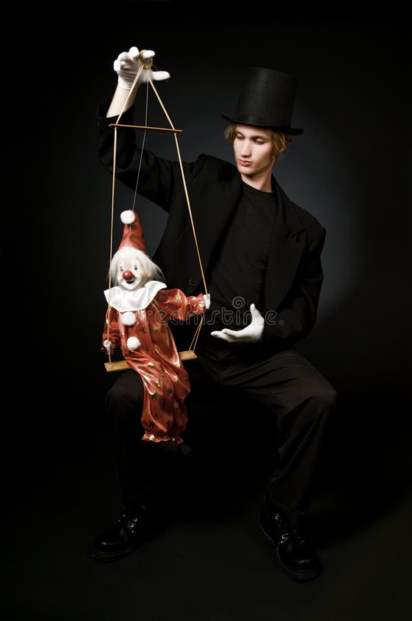 Maître marionnettiste photo stock. Image du homme, illusion - 7230964