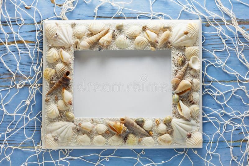 Maritime Picture Frame Mockup with Sail Boat and Helm in Front of Blue ...