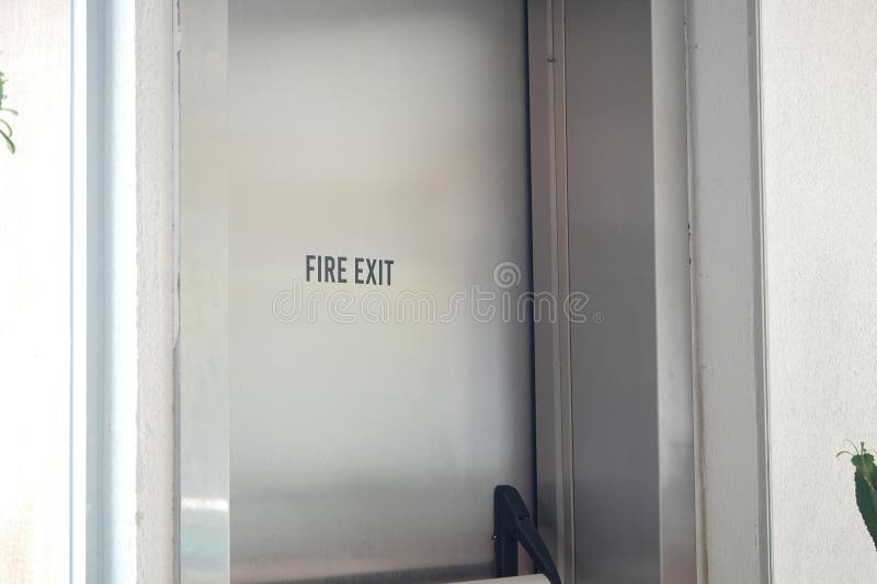 Marked Fire Exit in Hallway Stock Photo - Image of safety, signage ...