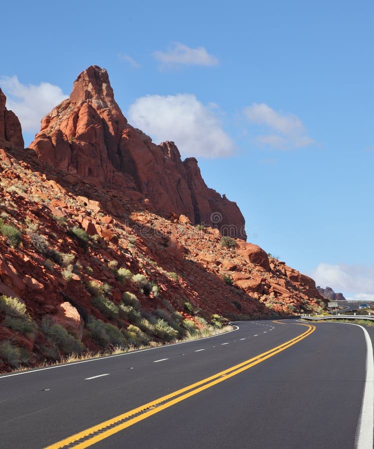 The Marked Road Passes between Rocks Stock Photo - Image of speed ...