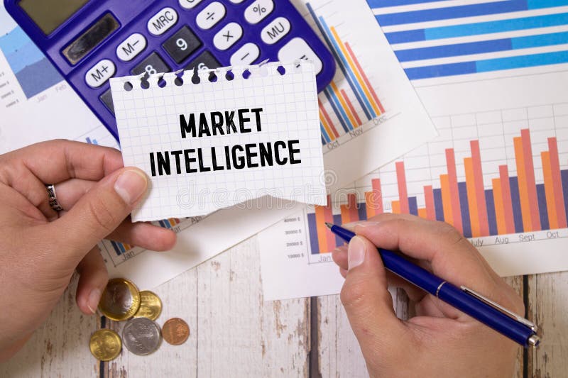 MARKET INTELLIGENCE Word on the Yellow Paper with Office Tools on White ...
