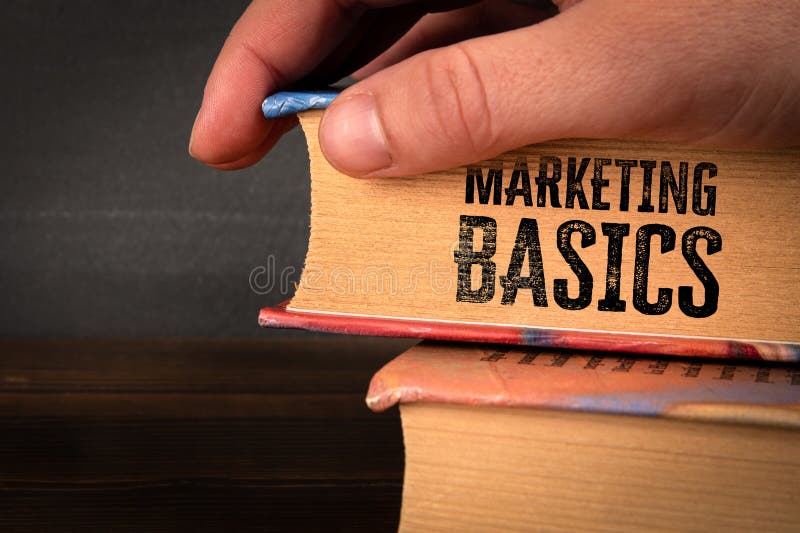 MARKETING BASICS. Stack of Books on a Wooden Shelf Stock Photo - Image ...