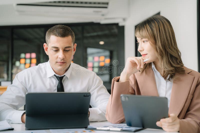 Marketing Staff are Analyzing the Data To Business Planning at Office ...