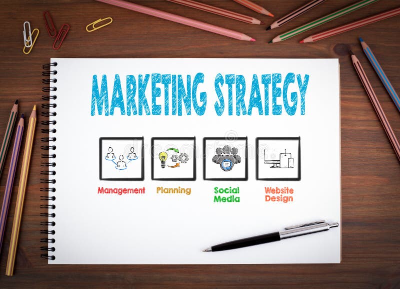 Marketing Strategy. Notebooks, Pen and Colored Pencils on a Wooden ...