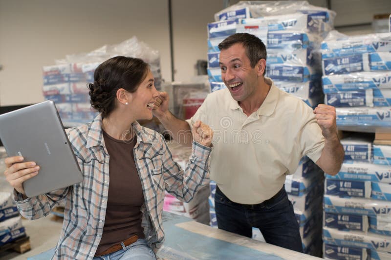 Marketing Workers Laughing while Working Stock Image - Image of ...