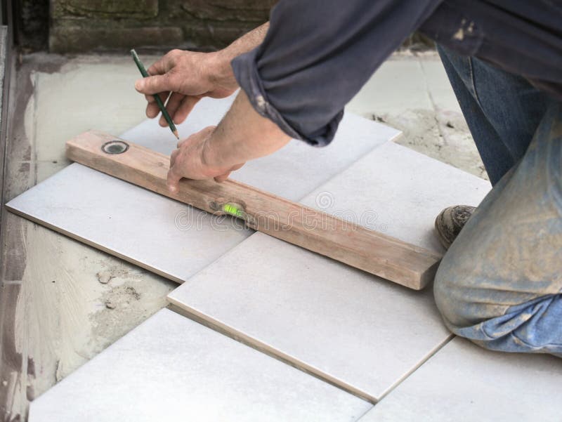 Marking a Floor Tile for Cutting Stock Photo - Image of construction ...