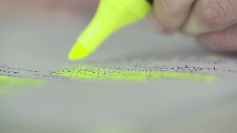 Marking an Important Text in a Note with a Yellow Marker Stock Footage ...