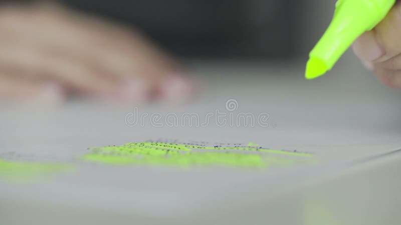 Marking an Important Text in a Note with a Yellow Marker Stock Footage ...