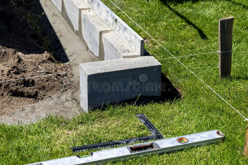 Marking Out Concrete Block Foundations for the Terrace Behind the House ...