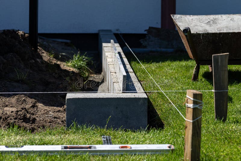 Marking Out Concrete Block Foundations Terrace Behind House Using ...