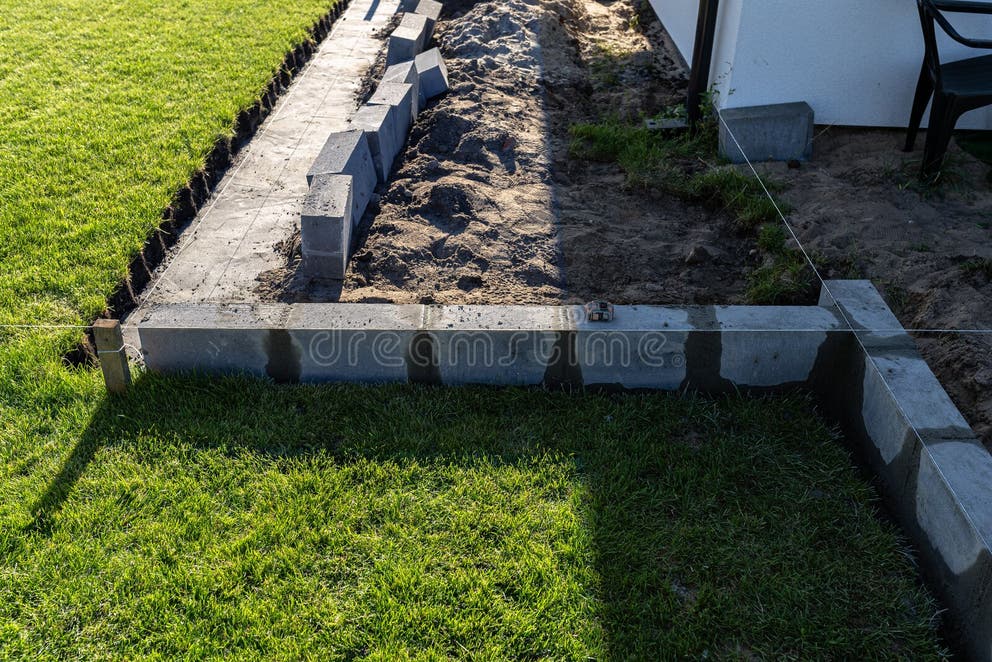 Marking Out Concrete Block Foundations for the Terrace Behind the House ...