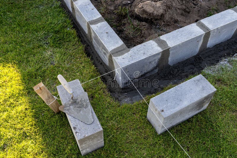 Marking Out Concrete Block Foundations for the Terrace Behind the House ...