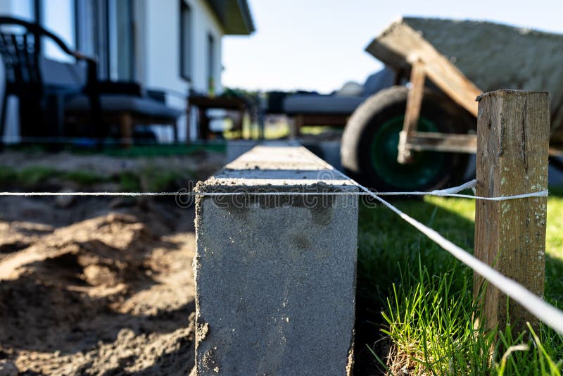 Marking Out Concrete Block Foundations for the Terrace Behind the House ...