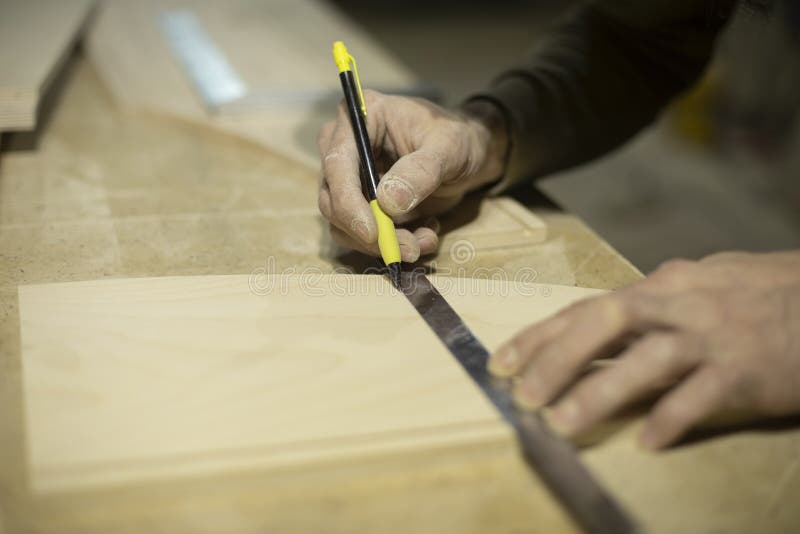 Marking on Ruler with Pencil. Drawing Line on Tree Stock Photo - Image ...